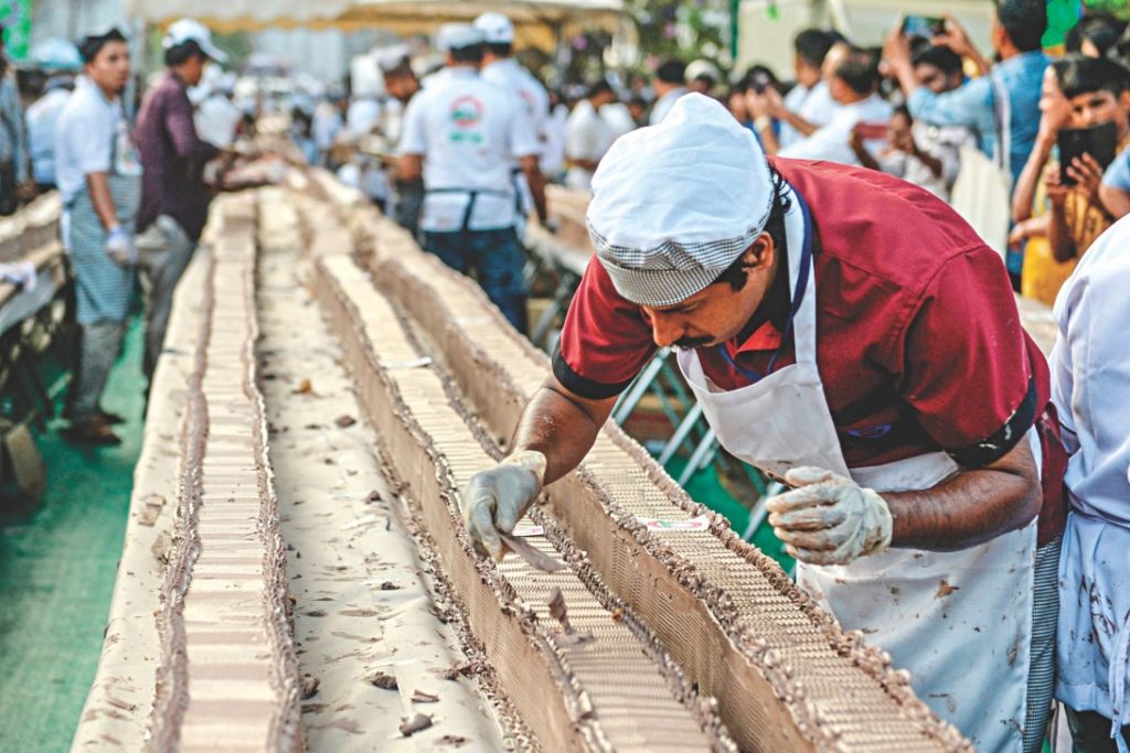 Weird World: Bakers in India bake a 6km long vanilla cake - The Sauce